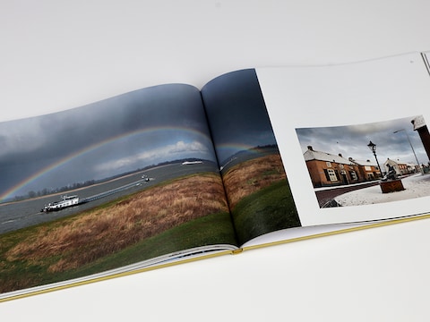 Basisscholen Maas en Waal ontvangen fotoboeken van Hans Barten | Regio ...